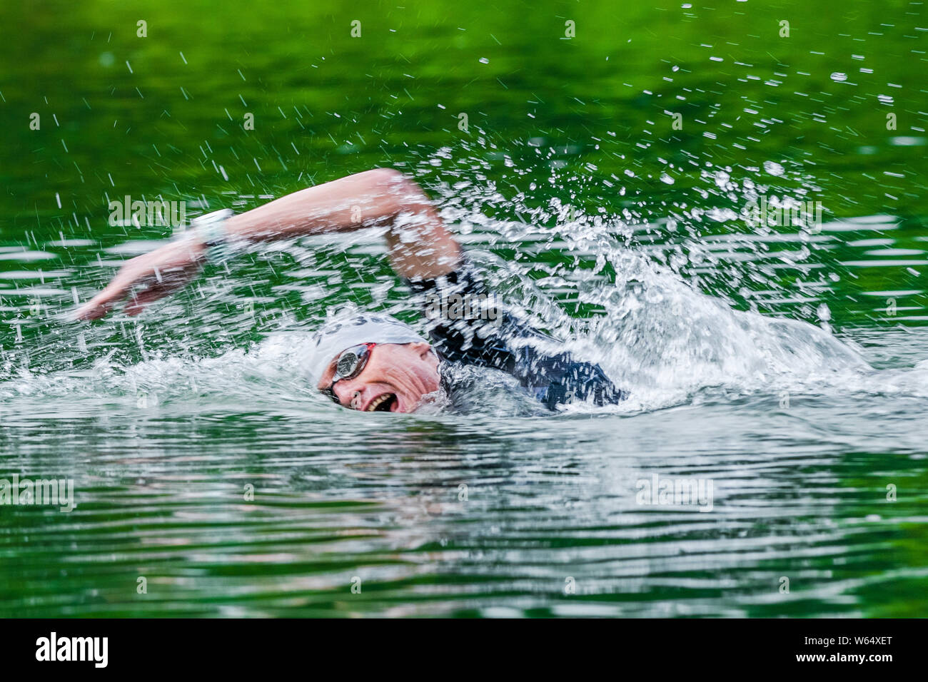 David Dellow of Australia competes in the swimming race during 2018 ...