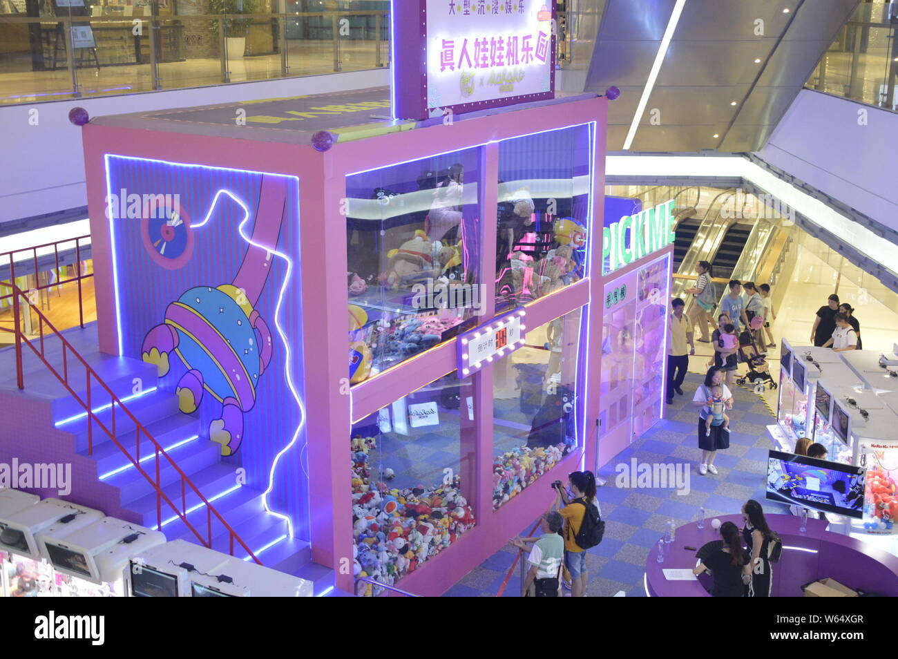 View of a two-storey human doll-grabbing machine, which is China's ...