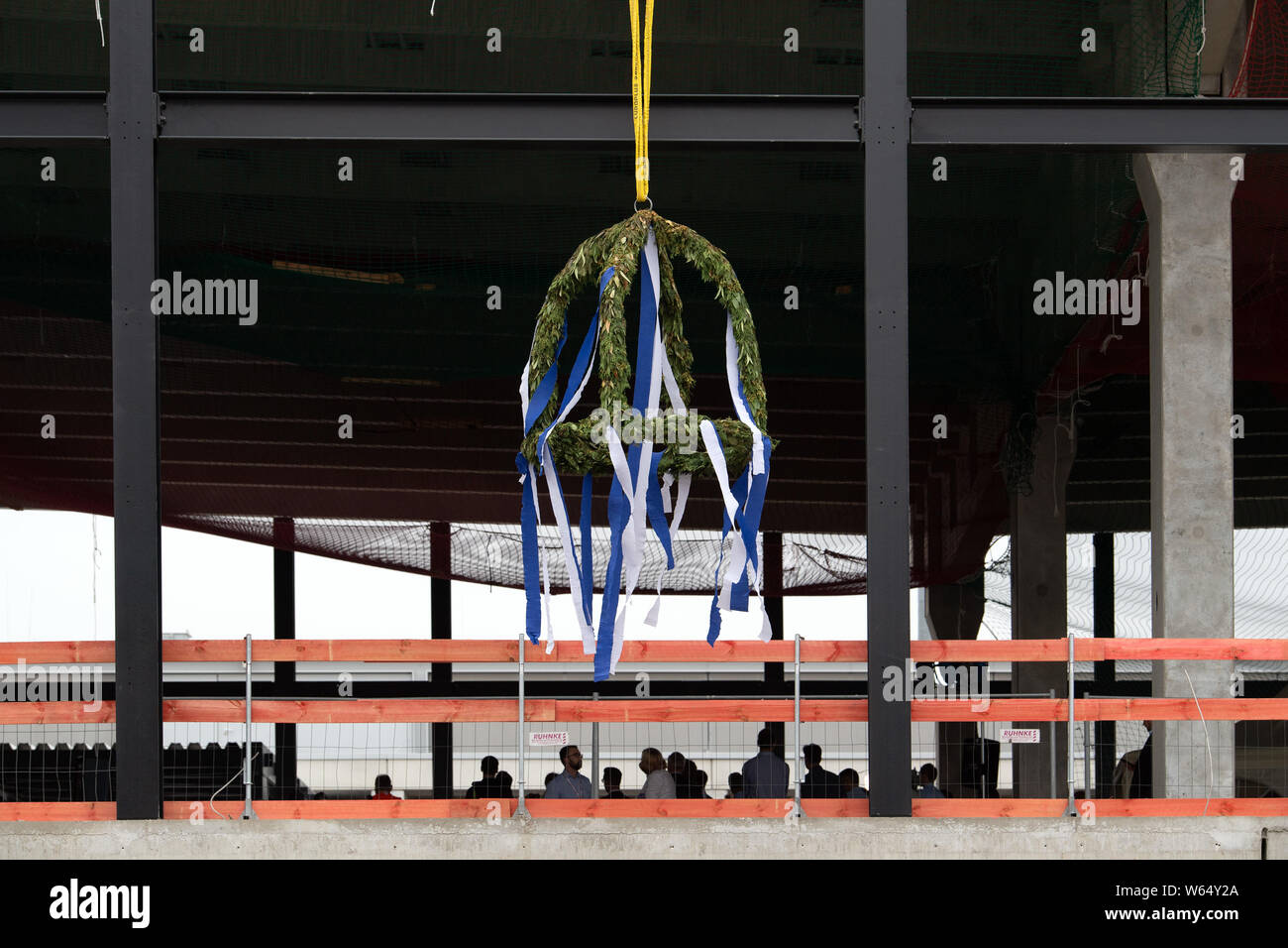 Berlin, Germany. 30th July, 2019. During the topping-out ceremony for ...