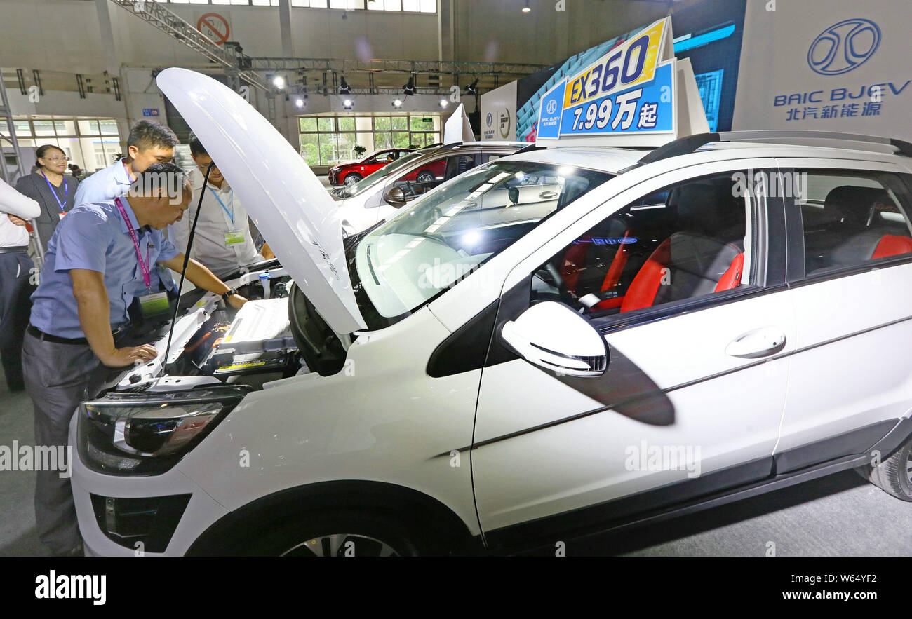 --FILE--A EX360 electric vehicle (EV) of BAIC BJEV is on display during an auto show in Beijing ...