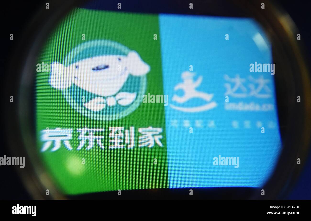 --FILE--View of logos of Dada Express, right, and grocery e-commerce ...