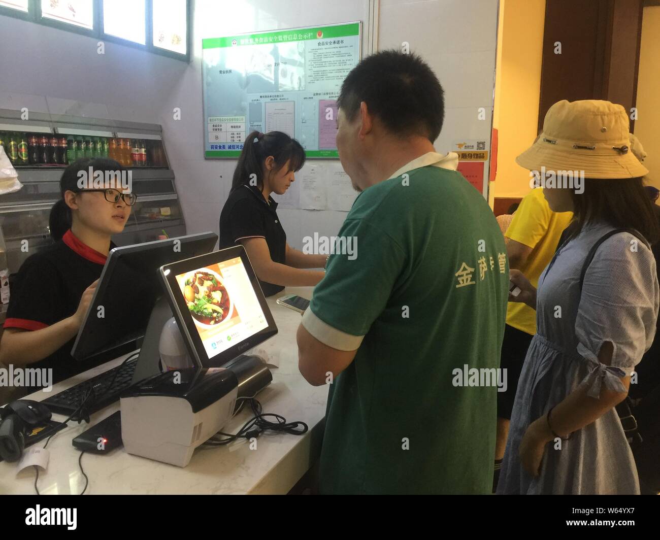 Diners are seen at the head branch of a chain noodle shop that sells ...