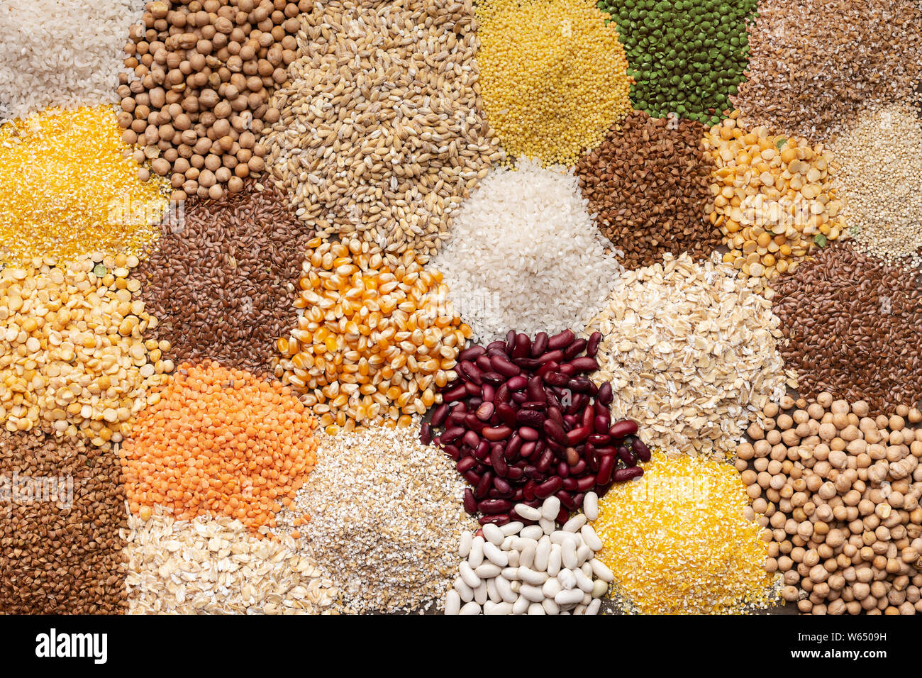 Close up of colored healthy grains and beans Stock Photo - Alamy