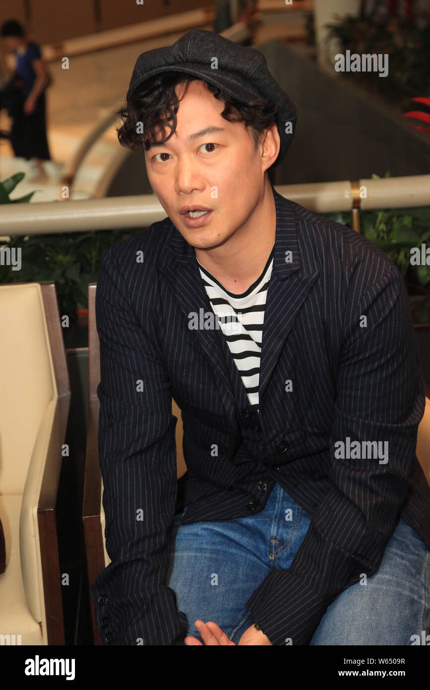 Hong Kong singer Eason Chan attends a ceremony of Universal Music in ...