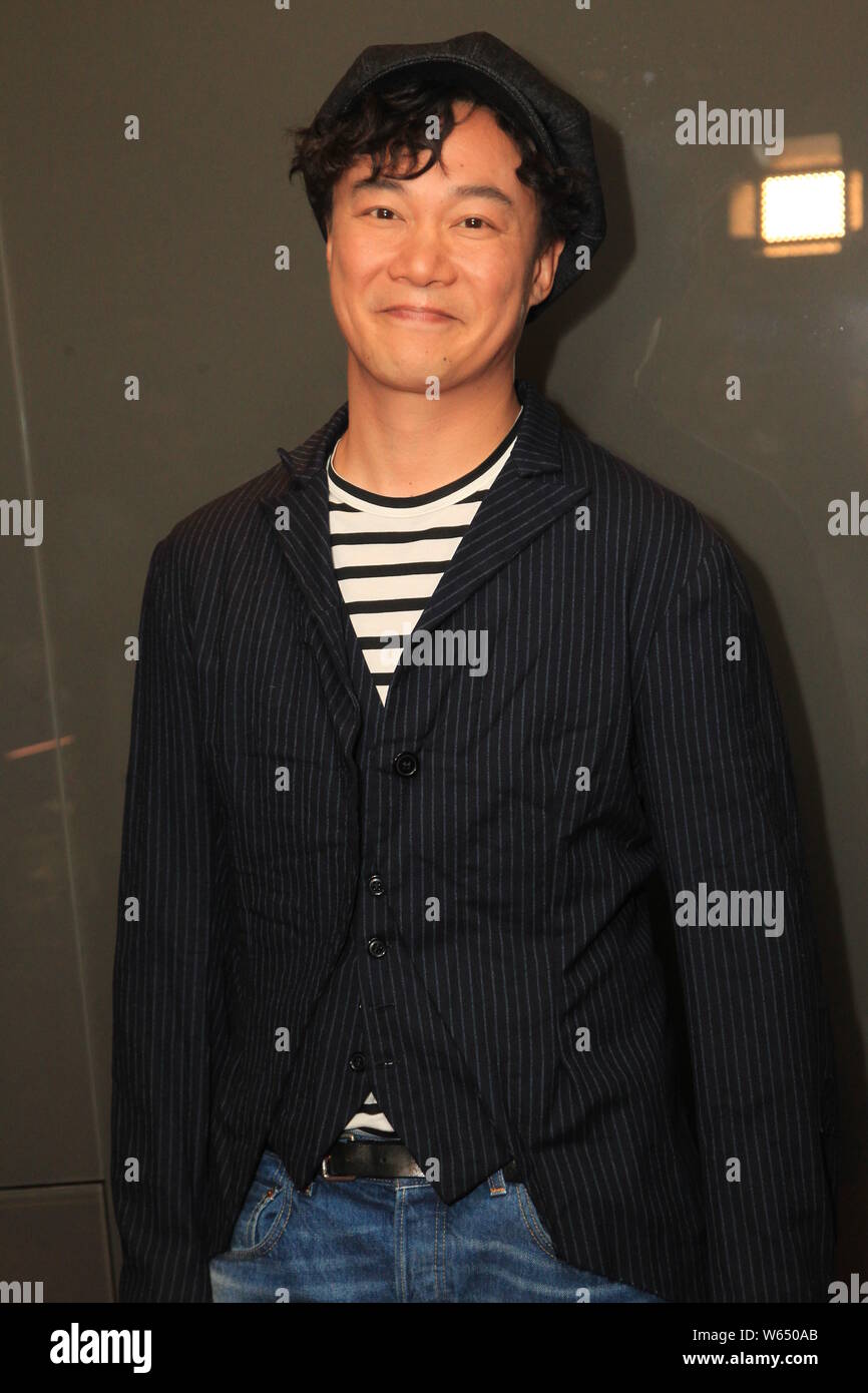 Hong Kong singer Eason Chan attends a ceremony of Universal Music in ...