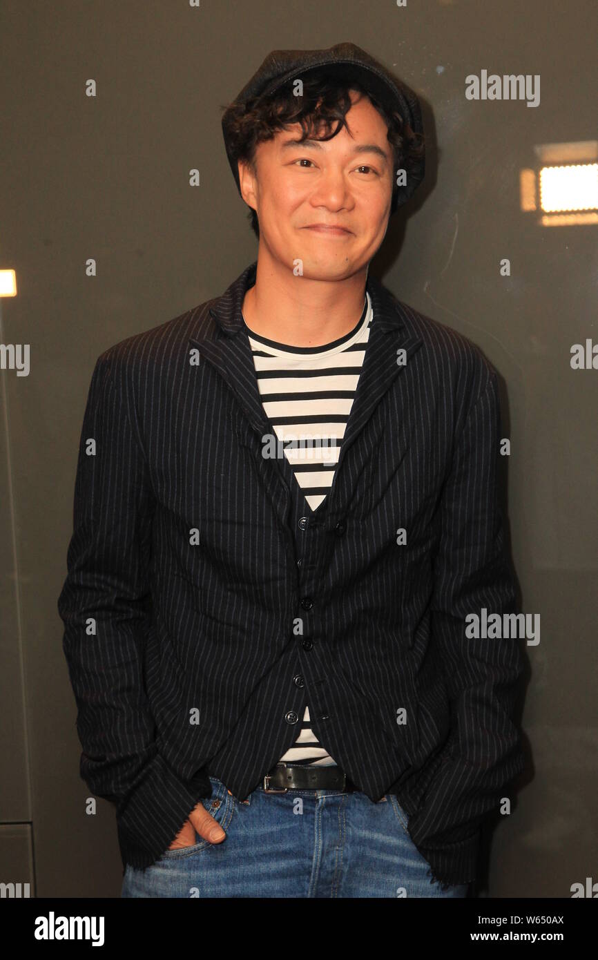 Hong Kong singer Eason Chan attends a ceremony of Universal Music in ...