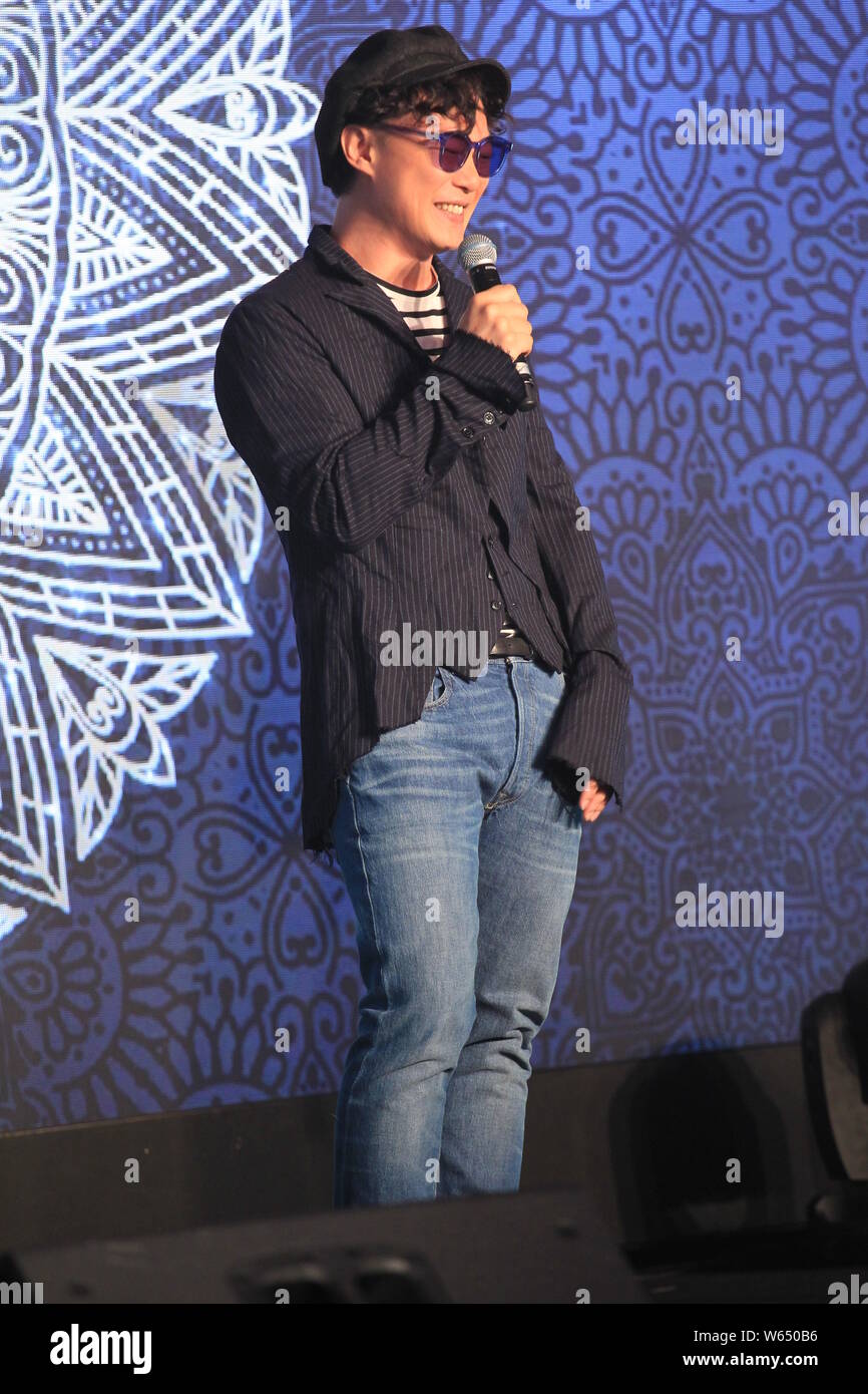 Hong Kong singer Eason Chan attends a ceremony of Universal Music in ...