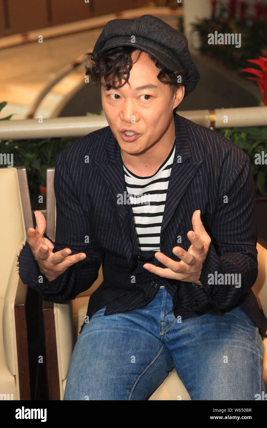 Hong Kong singer Eason Chan attends a ceremony of Universal Music in ...