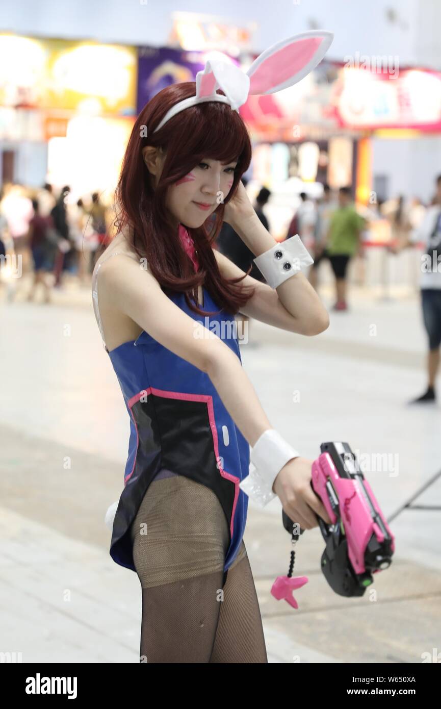 A Chinese coser dressed in cosplay costume poses during the Beijing ...