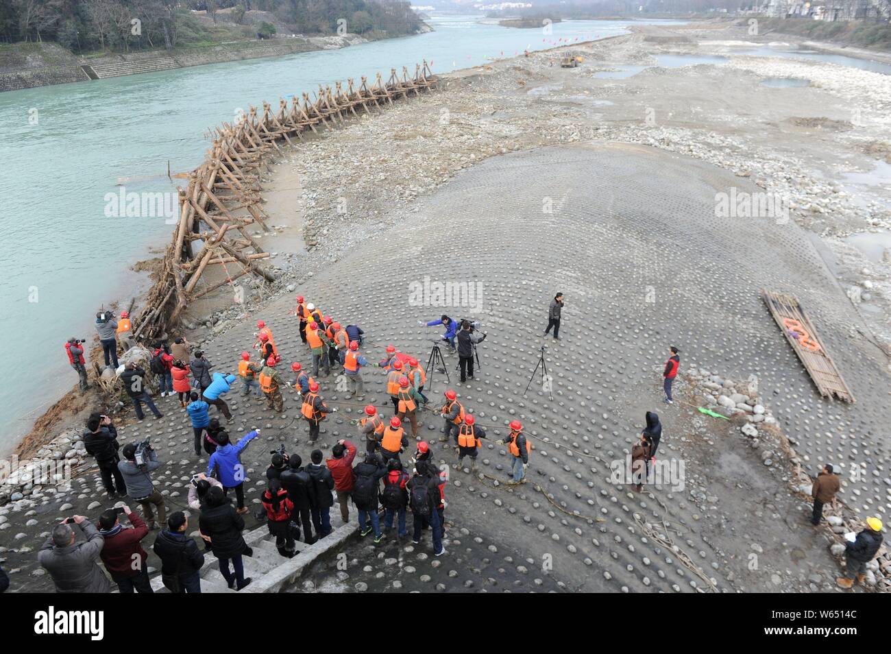 View of the Dujiangyan irrigation system under renovation over Min ...