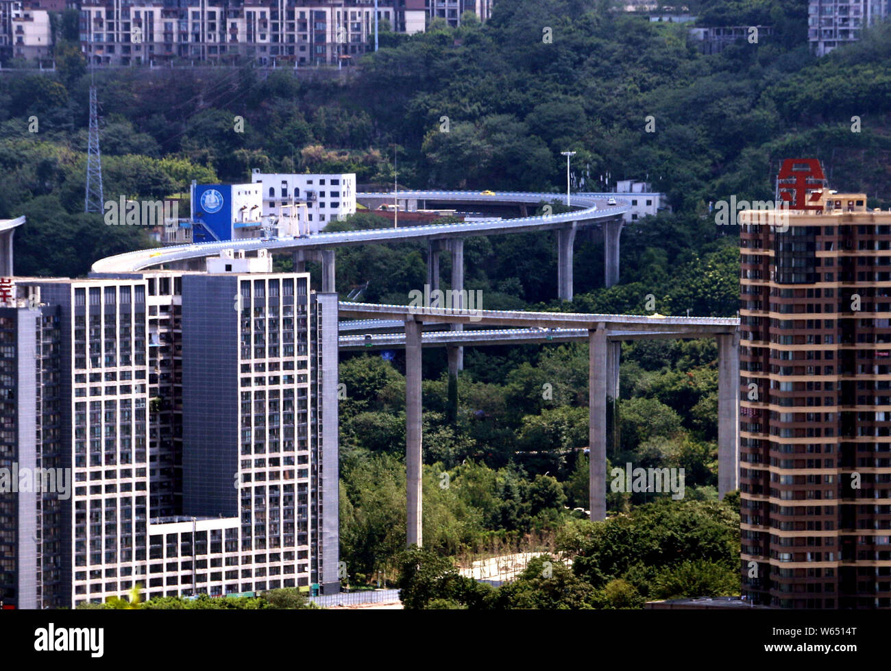 Cars drive on China's tallest highway interchange, Sujiaba Interchange ...
