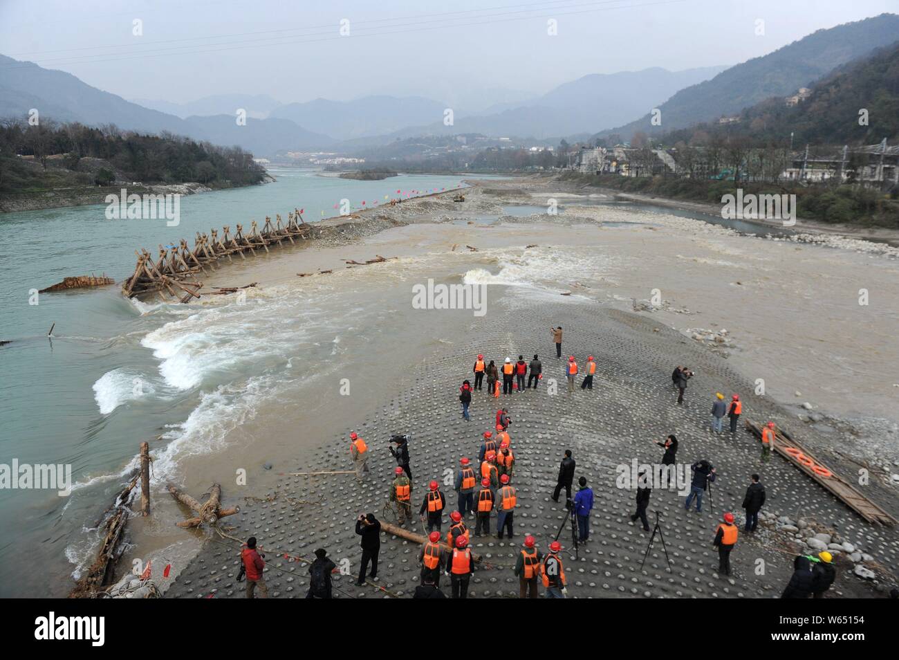 View of the Dujiangyan irrigation system under renovation over Min ...