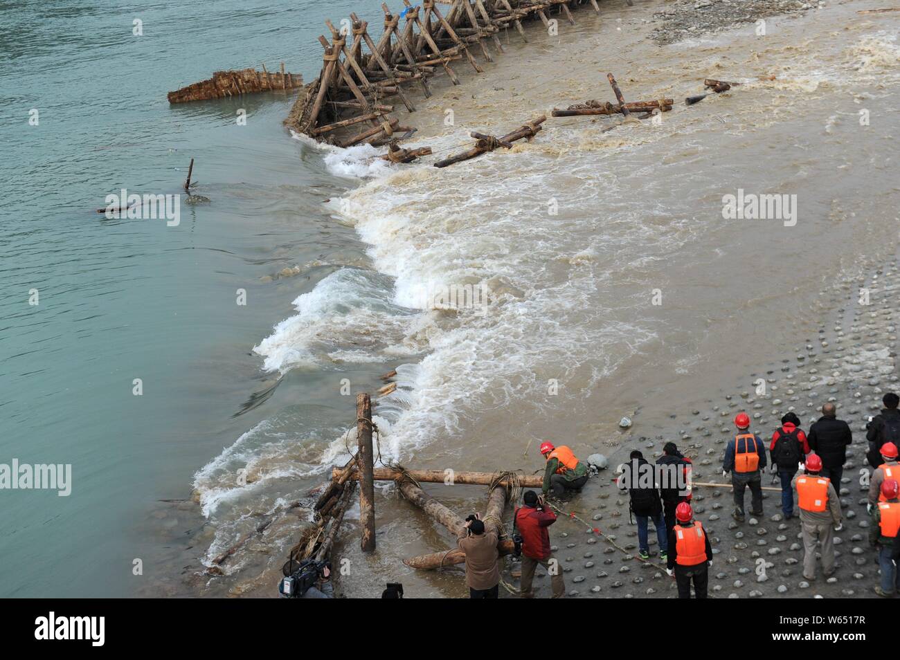 View of the Dujiangyan irrigation system under renovation over Min ...