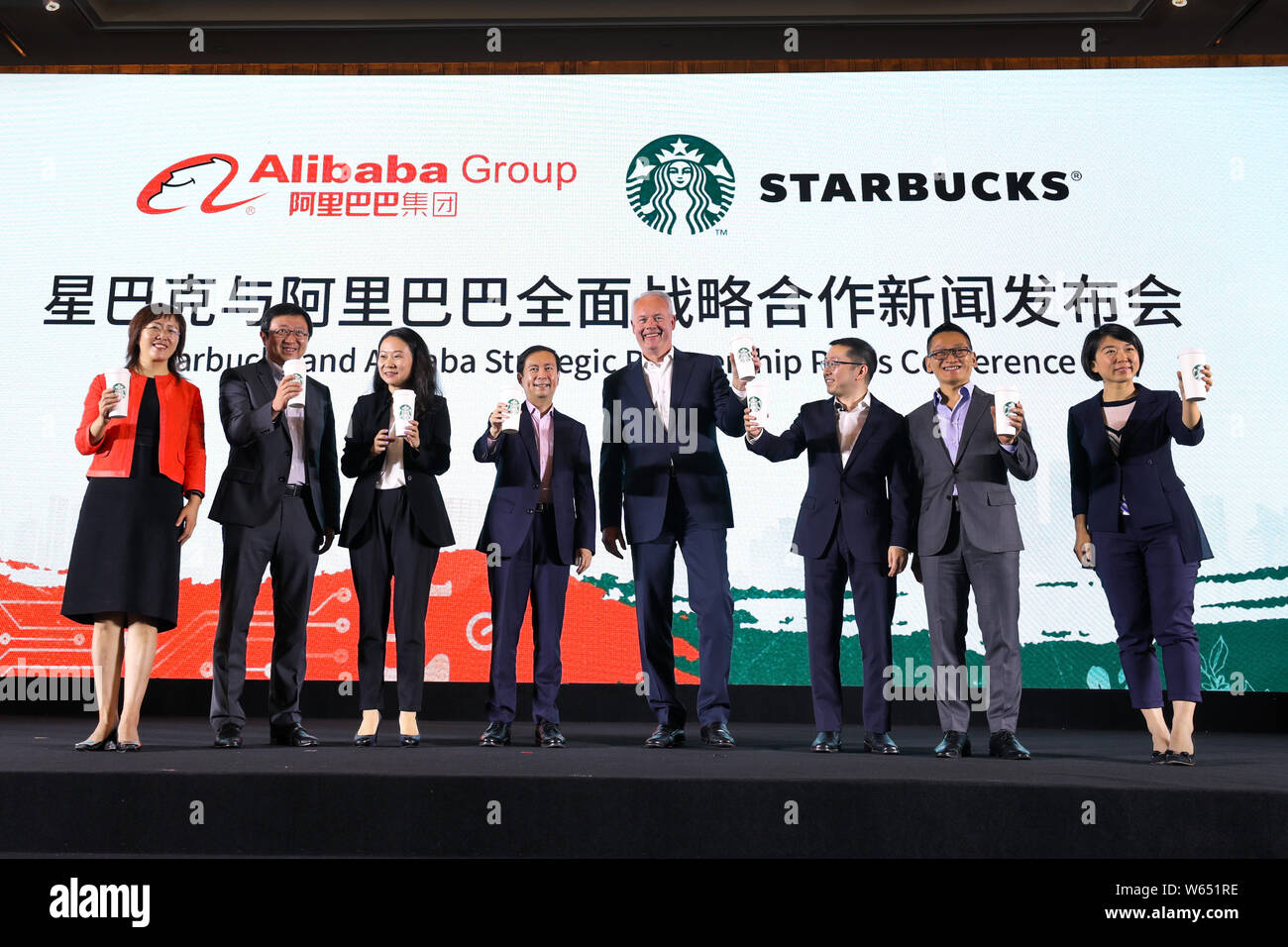 Daniel Zhang Yong, fourth left, CEO of Alibaba Group, Kevin Johnson ...