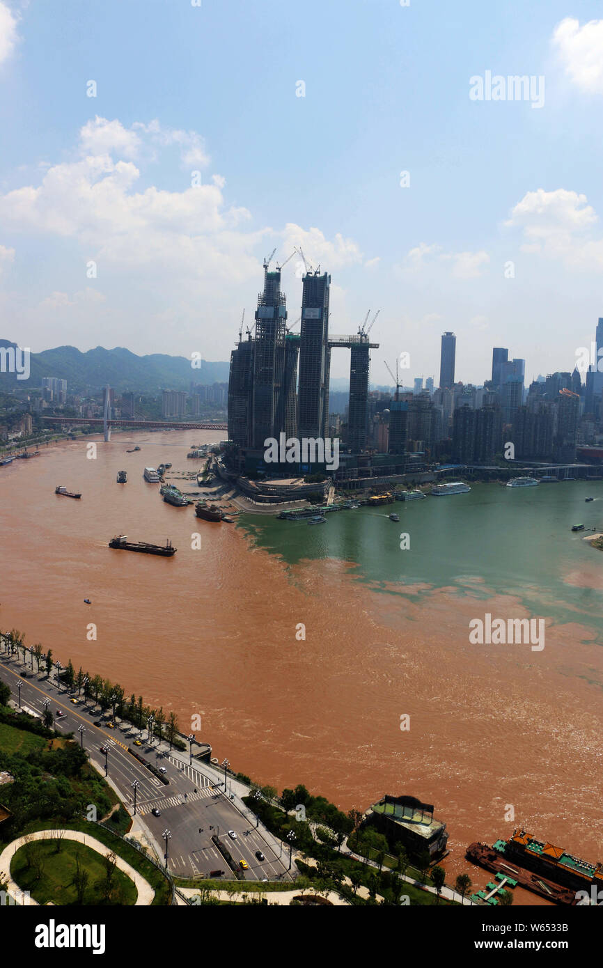 In this aerial view, boats shuttle back and forth on the confluence ...