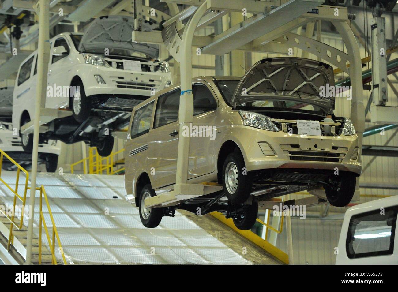 Cars of Wuling Motors are produced on the assembly line at an auto ...