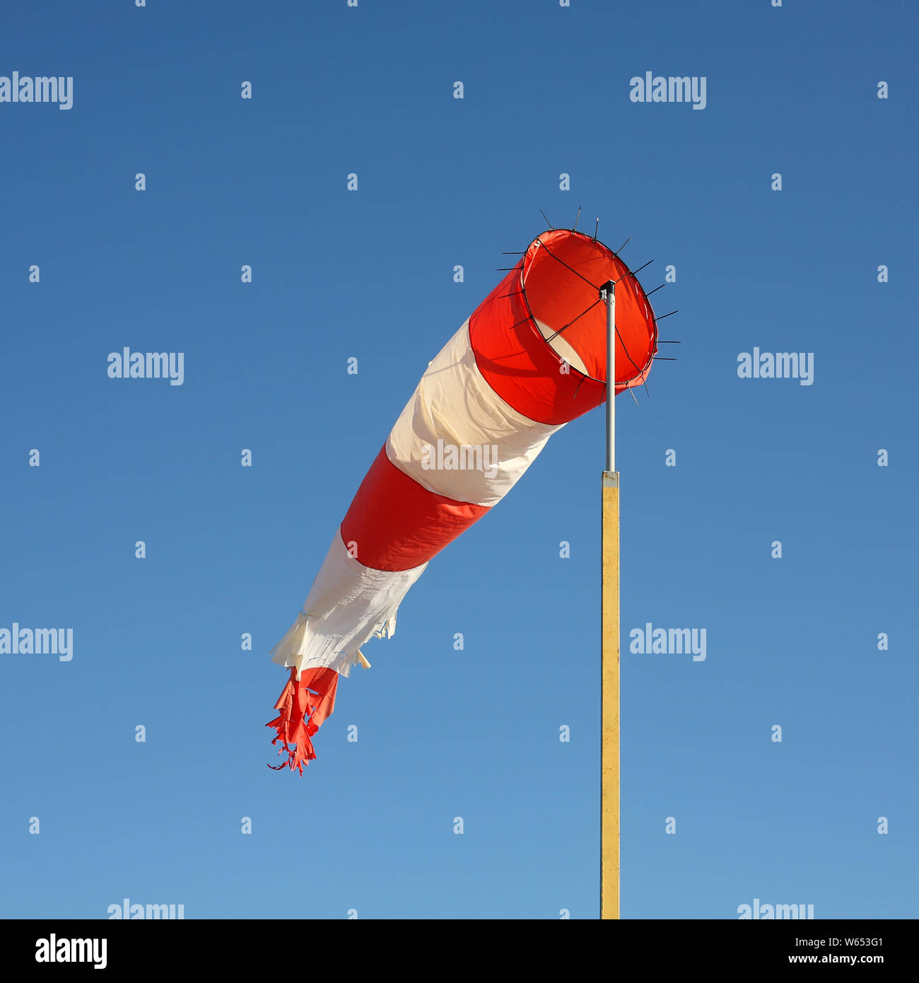 Boats parking and aircraft - Wind direction indicator. Windsock the sky ...