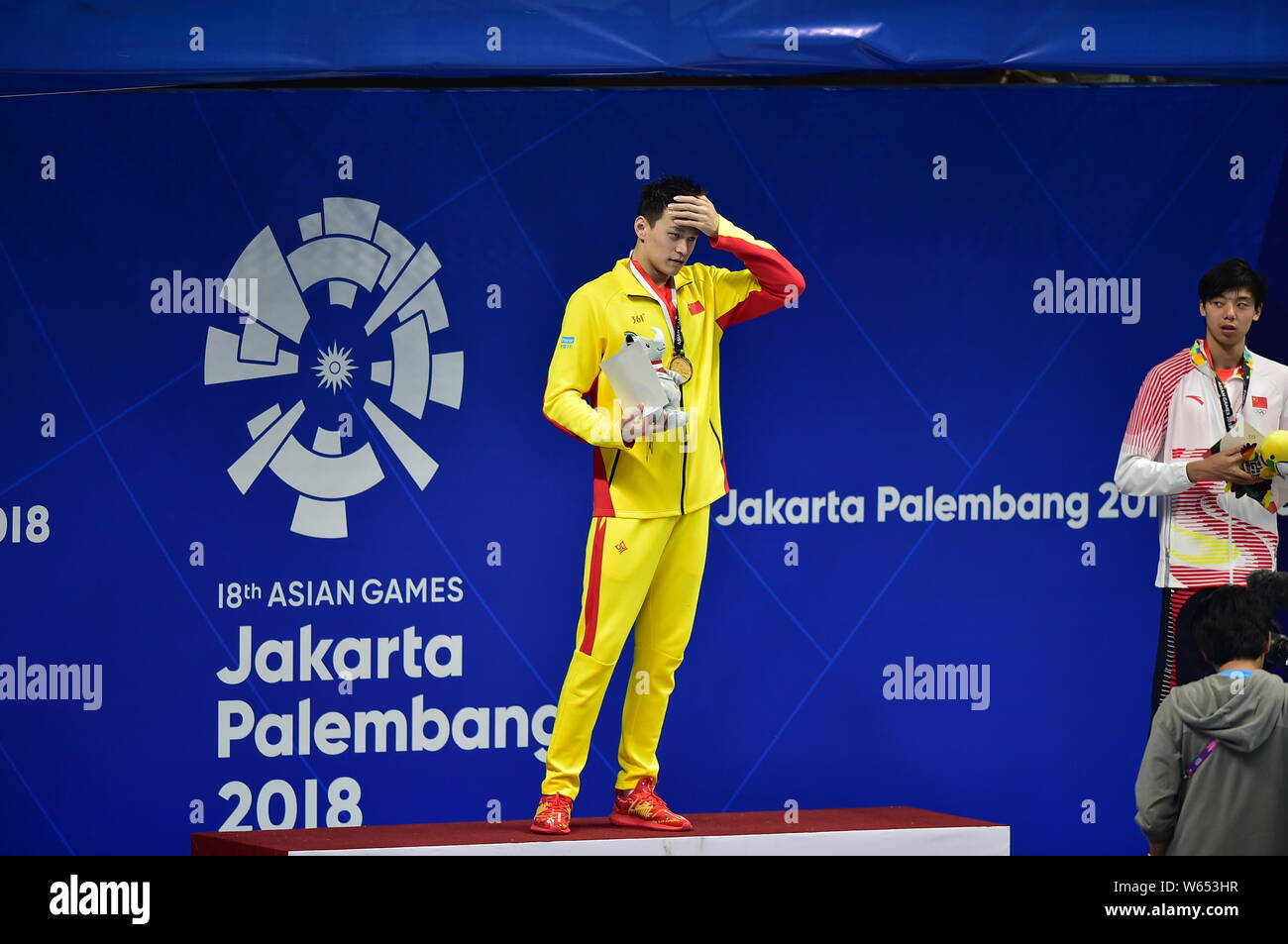 Gold medalist Sun Yang of China poses at the medal ceremony of the men ...