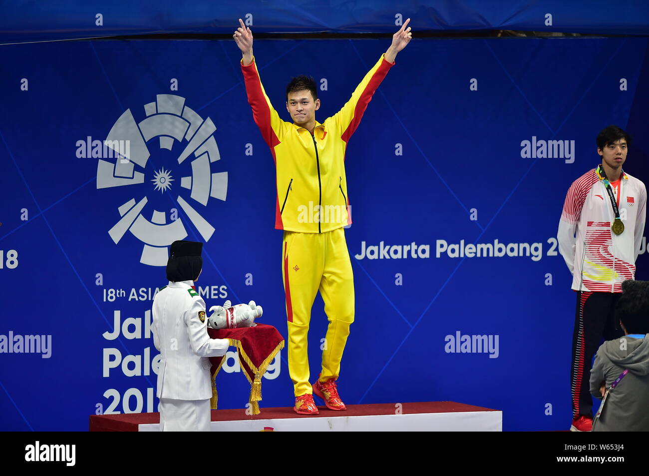 Gold medalist Sun Yang of China poses at the medal ceremony of the men ...