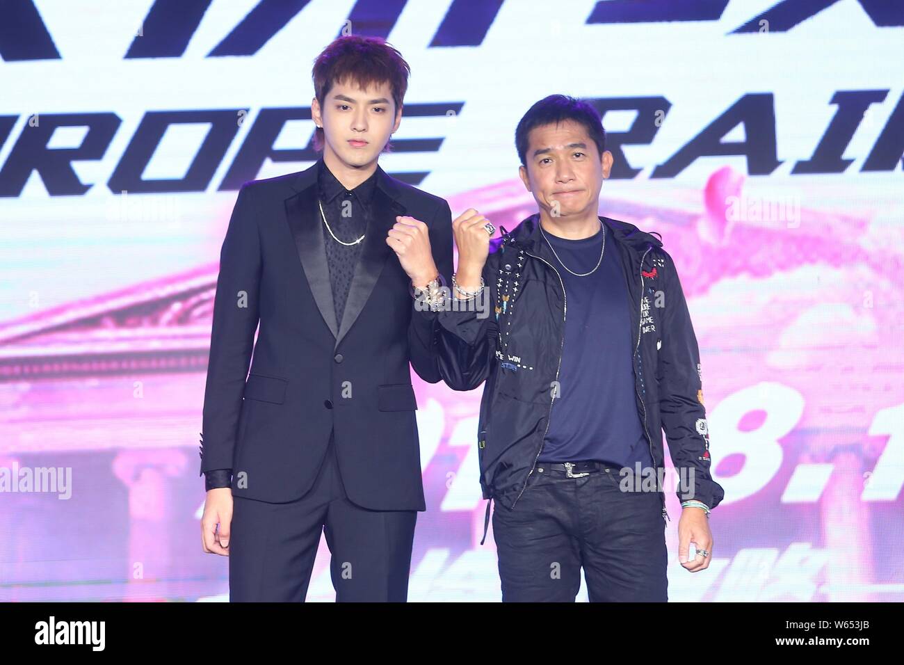 Chinese singer and actor Kris Wu or Wu Yifan, left, and Hong Kong actor ...