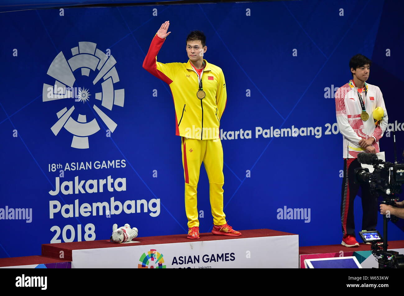 Gold medalist Sun Yang of China poses at the medal ceremony of the men ...