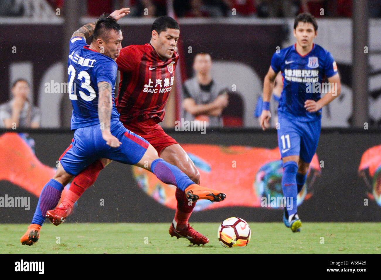 Brazilian football player Givanildo Vieira de Sousa, center, better ...