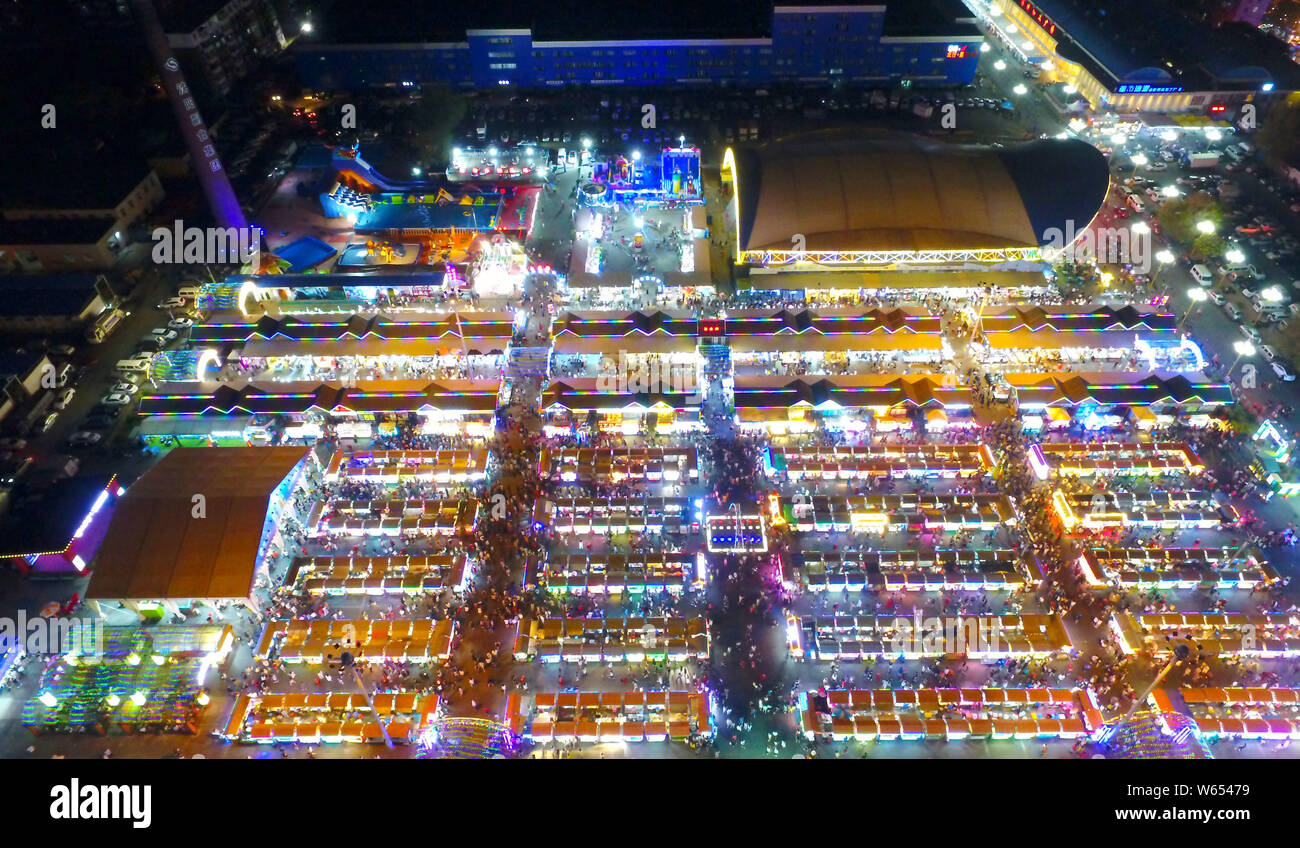 In this aerial view, the Xingshun International Night Market, reputed ...