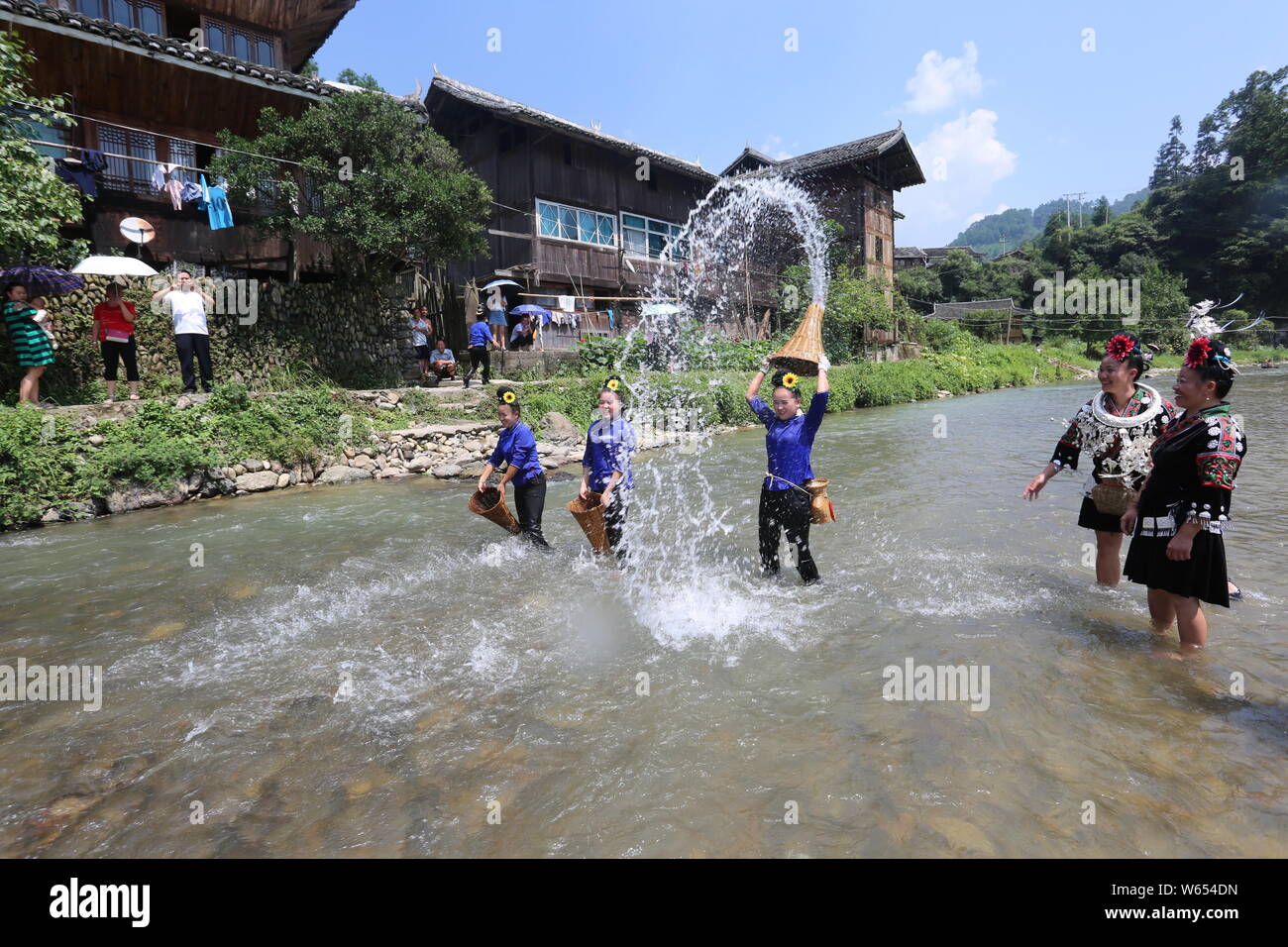 Chinese people of Miao ethnic minority celebrate the fish catching ...