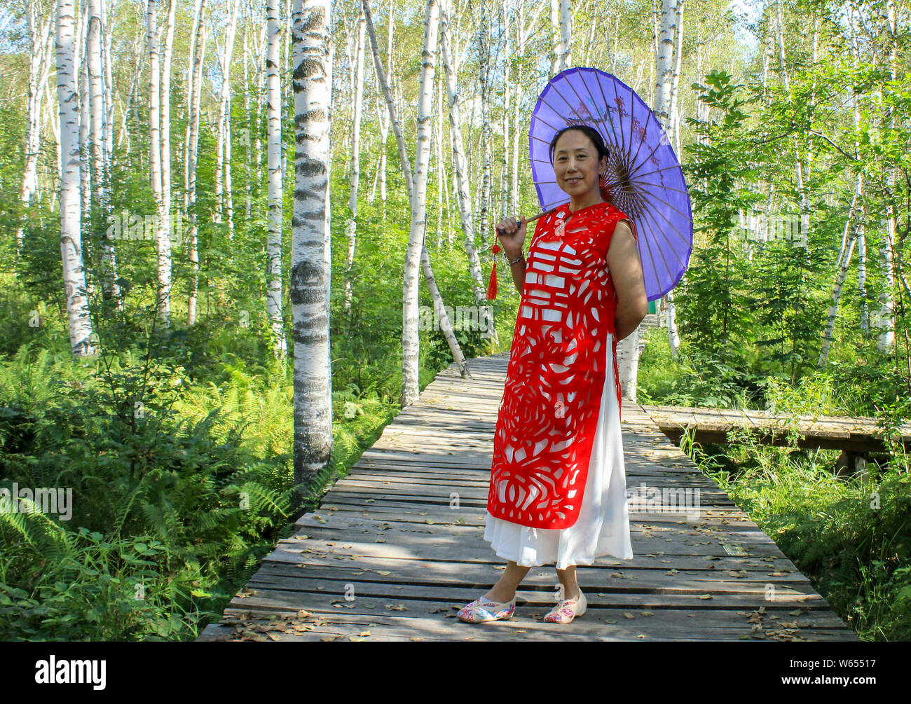 Daughter of 75-year-old Chinese elderly woman Zhang Guiying shows a ...