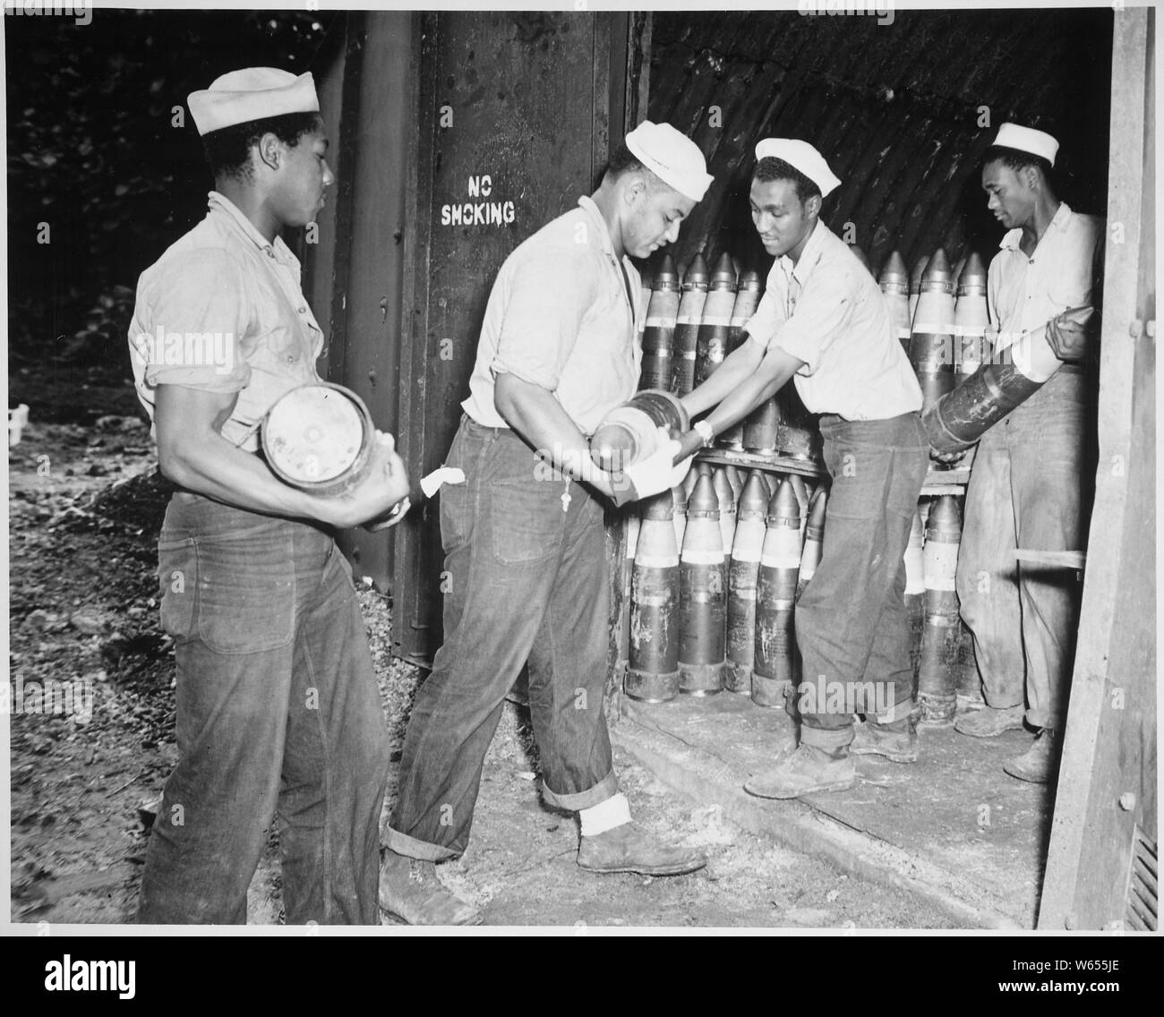 Enlisted men serving on Espiritu Santo in the New Hebrides...placing 6 ...