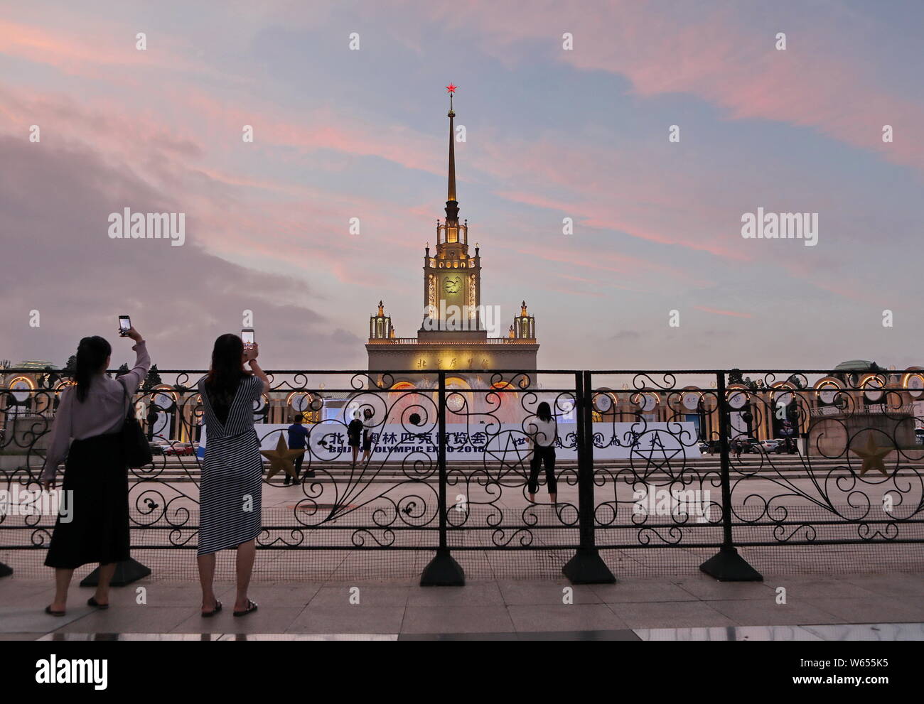 People visit the 2018 Olympic Expo marking the 10th anniversary of the ...