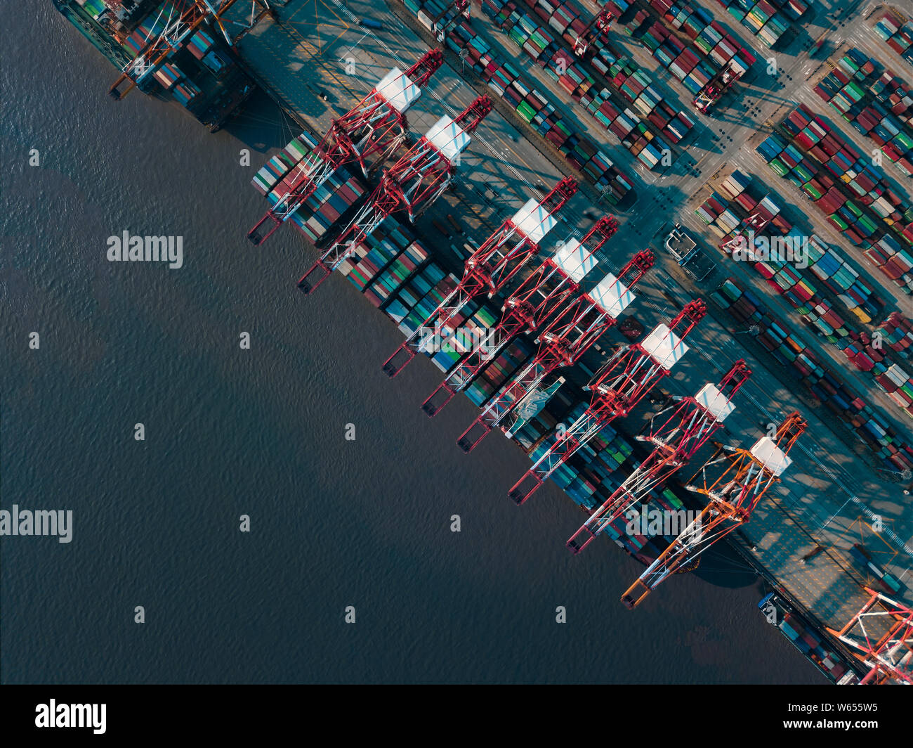 An aerial view of stacks of containers at the Yangshan Deep-Water Port ...
