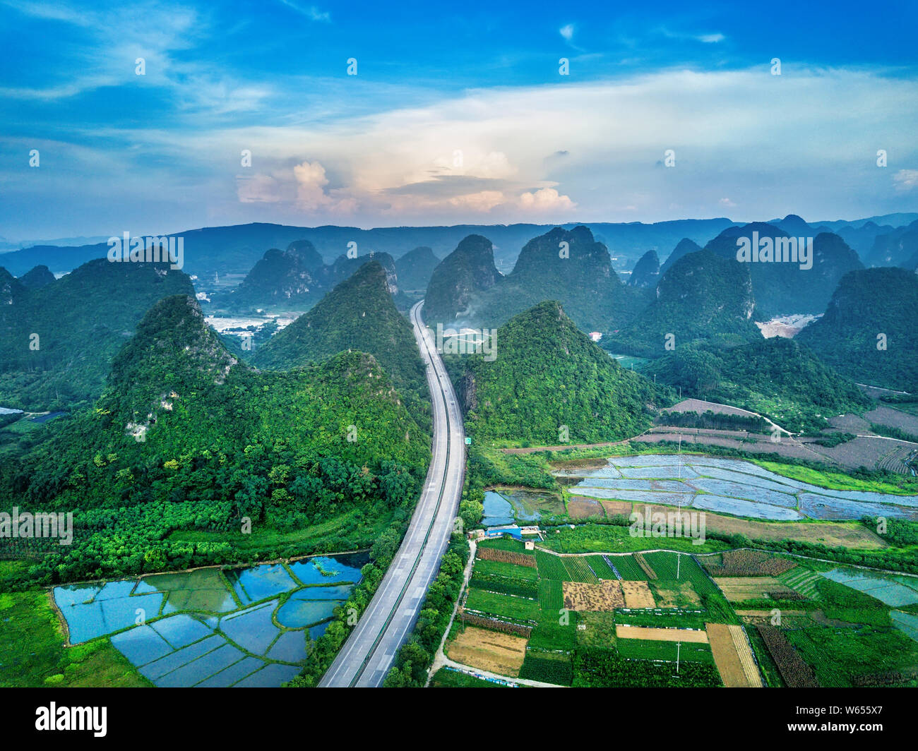 Landscape of the Sanjiang-Beihai Expressway through mountains and ...