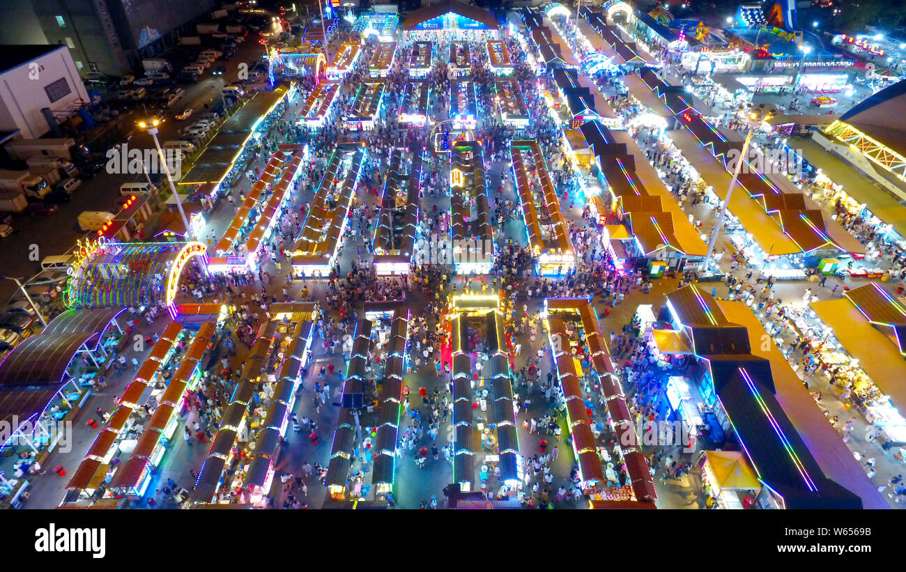 In this aerial view, the Xingshun International Night Market, reputed ...