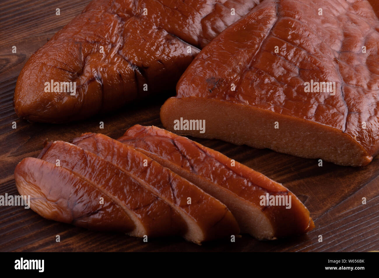 raw smoked cod caviar in wooden background Stock Photo - Alamy