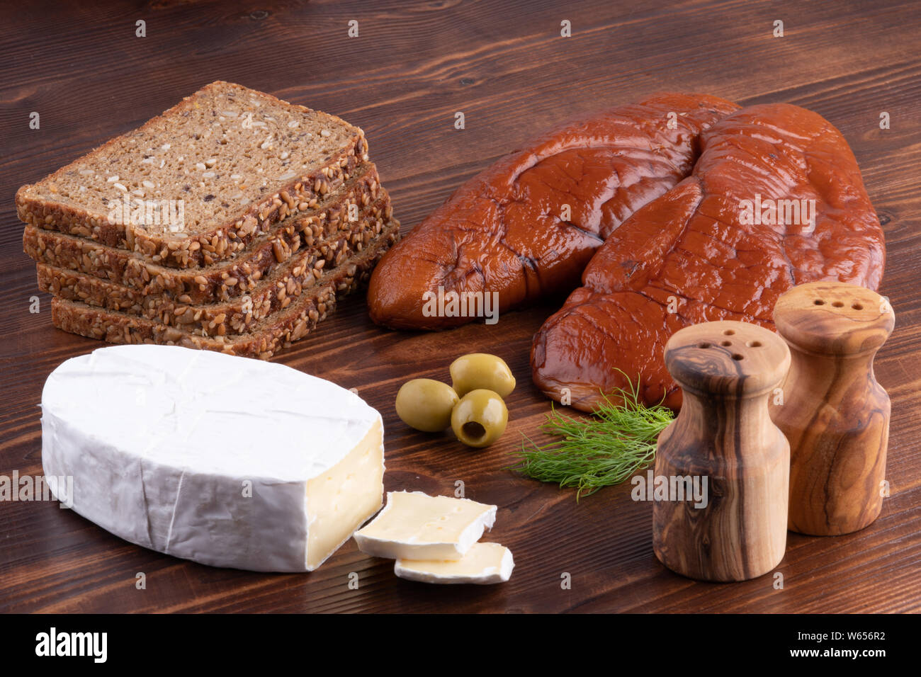 raw smoked cod caviar in wooden background Stock Photo - Alamy