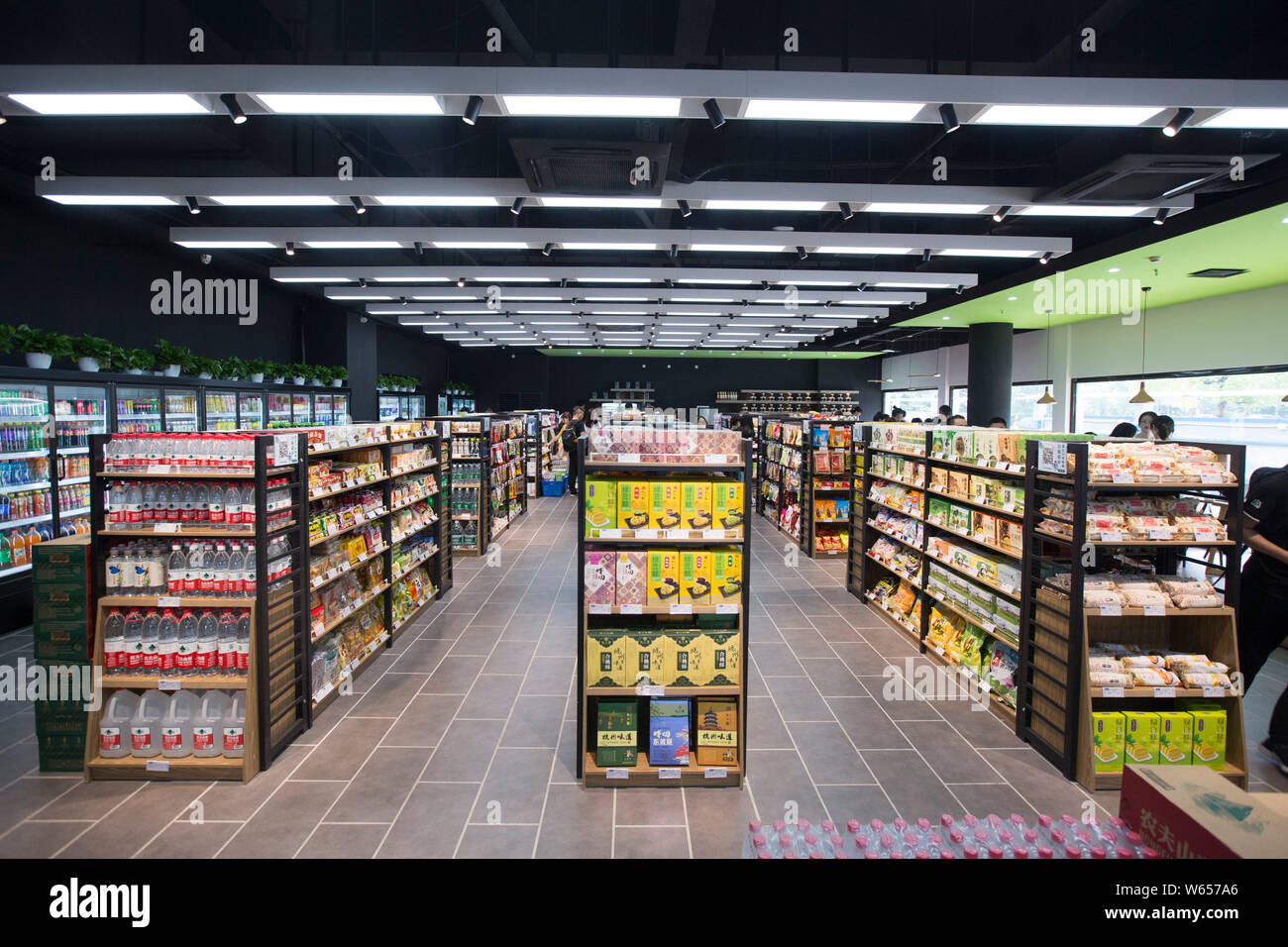 Students shop at a credit-based unmanned supermarket at the Zijingang ...