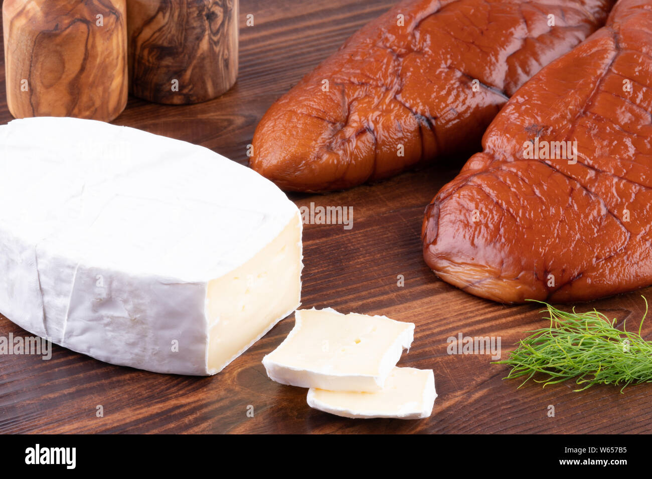 raw smoked cod caviar in wooden background Stock Photo - Alamy