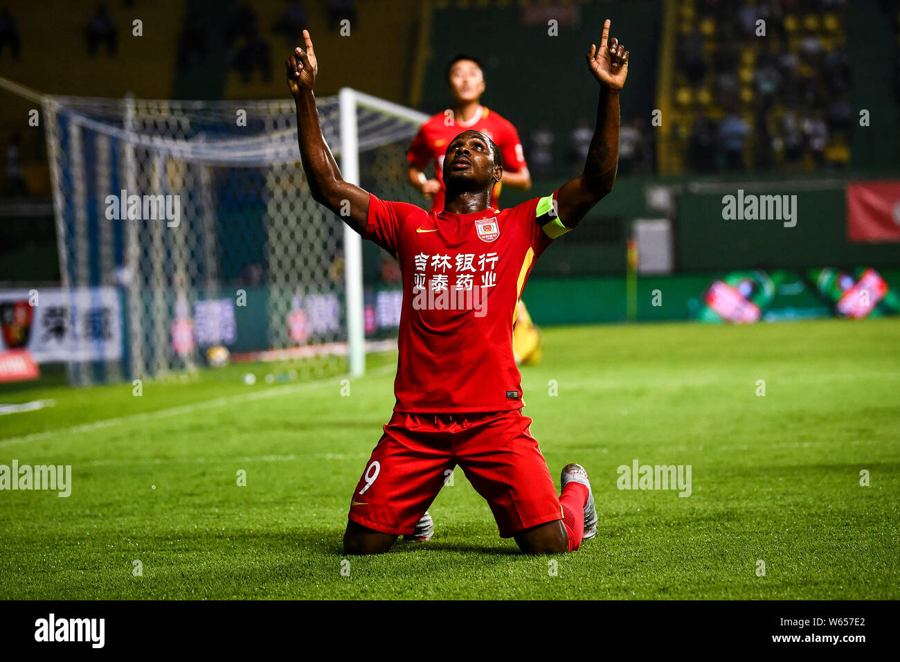 Nigerian football player Odion Ighalo of Changchun Yatai celebrates ...