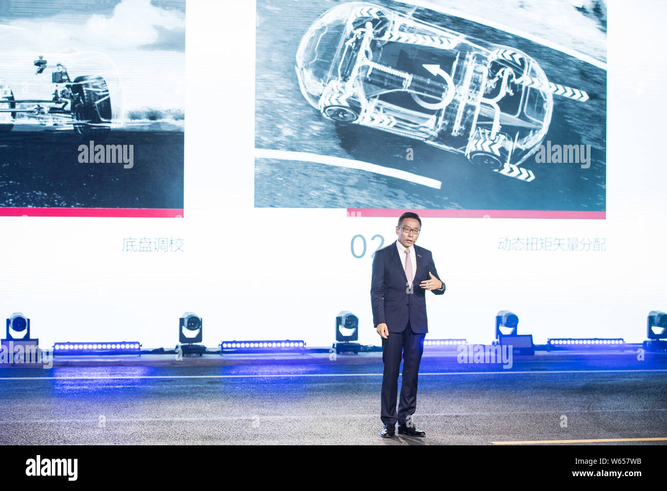 Lu Qun, Chairman of Qiantu Motor, delivers a speech during a launch ...