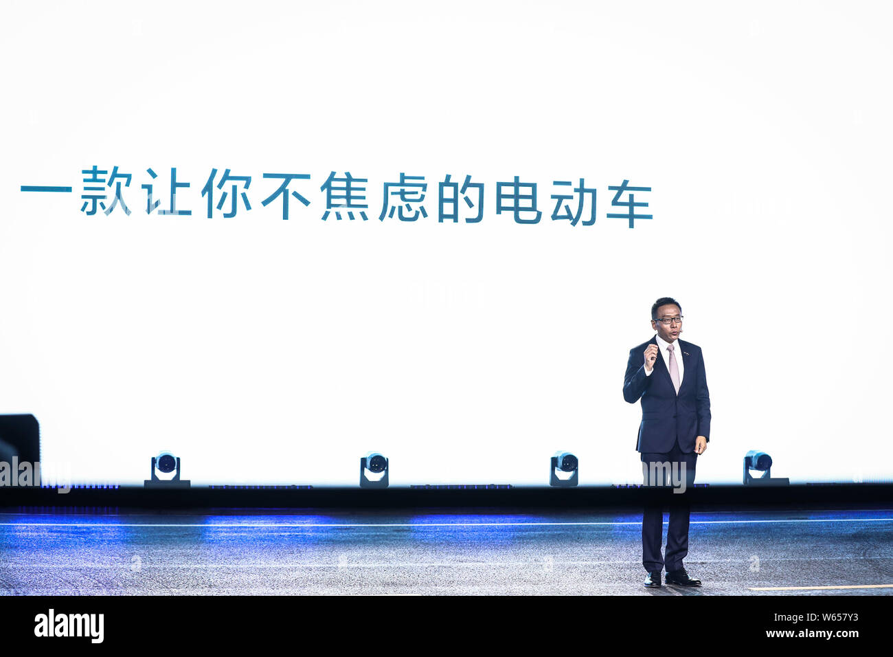 Lu Qun, Chairman of Qiantu Motor, delivers a speech during a launch ...