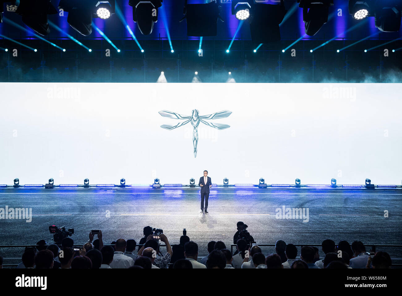 Lu Qun, Chairman of Qiantu Motor, delivers a speech during a launch ...