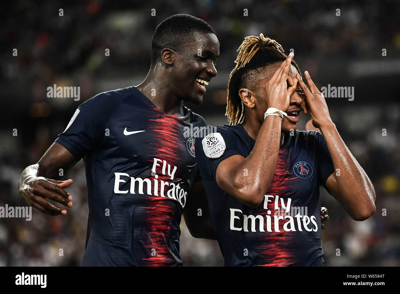 Christopher Nkunku, right, celebrates with his teammate Stanley Pierre ...