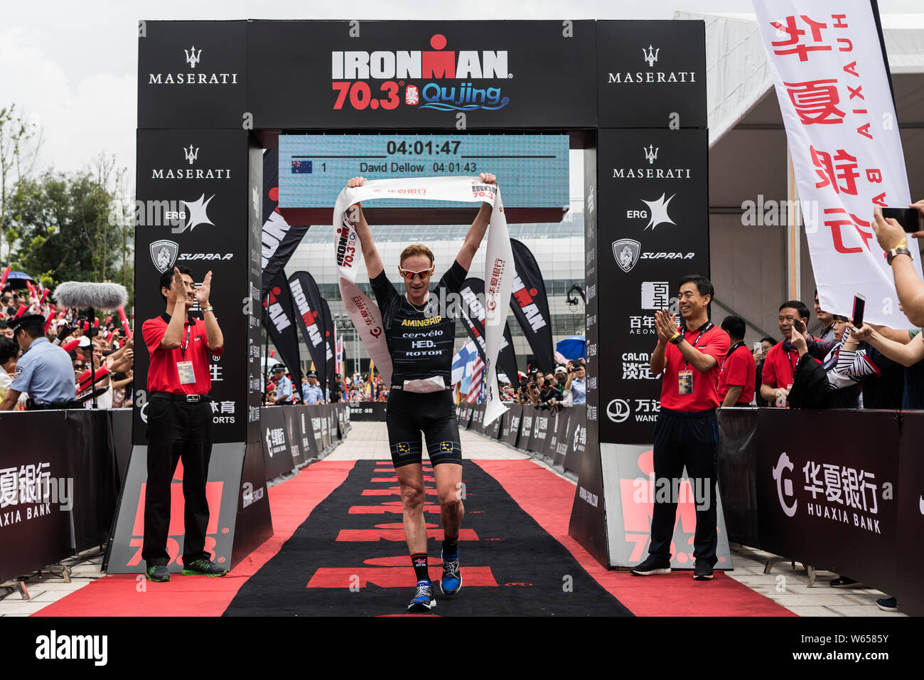 David Dellow of Australia dashes through the finish line to win the ...