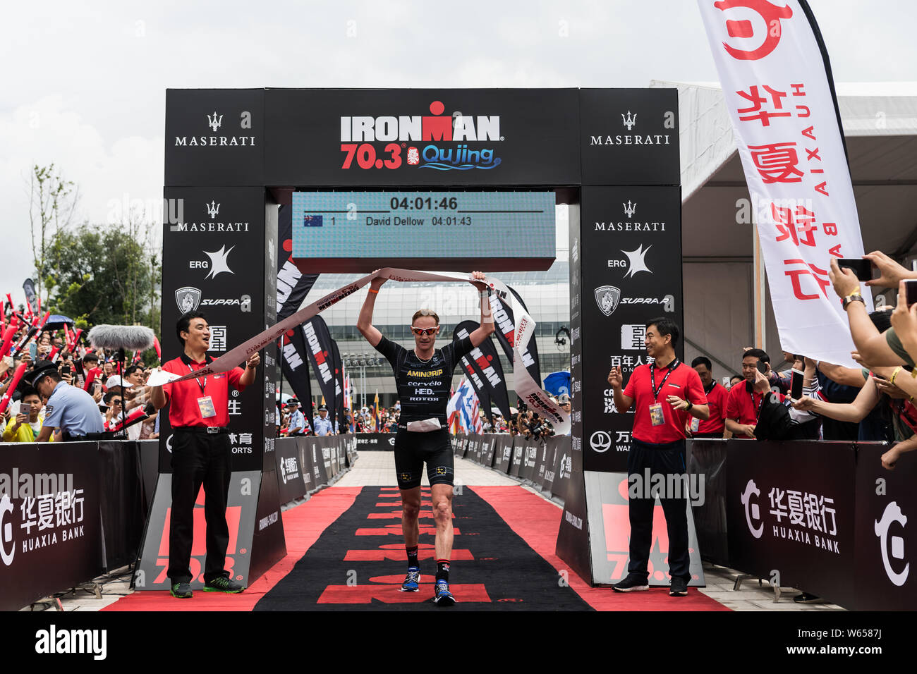 David Dellow of Australia dashes through the finish line to win the ...