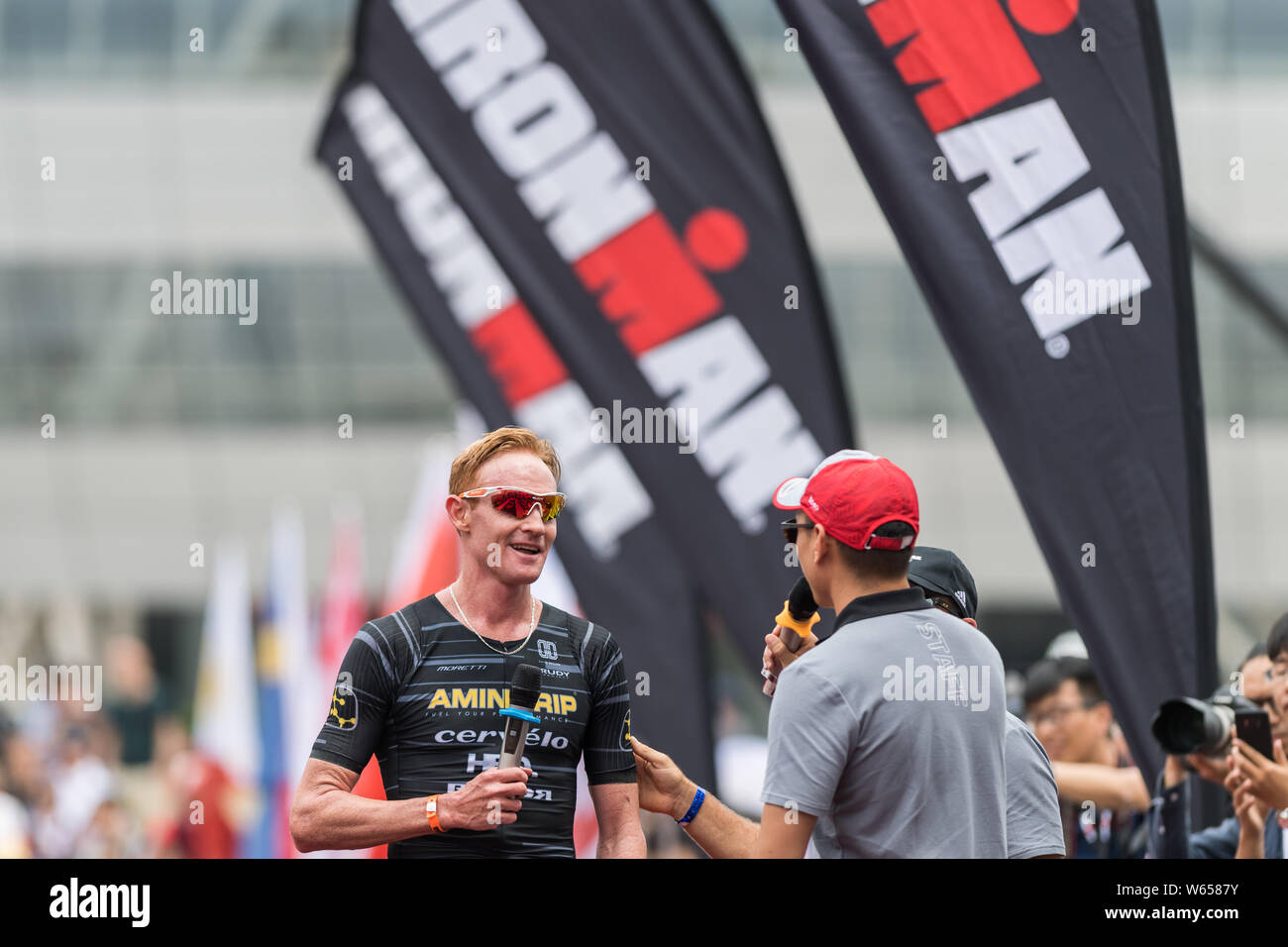 David Dellow of Australia is interviewed after winning the first place ...