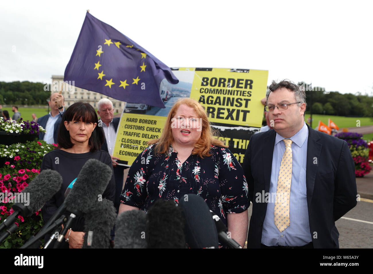 Alliance Leader Naomi Long (centre) and Stephen Farry, after speaking ...