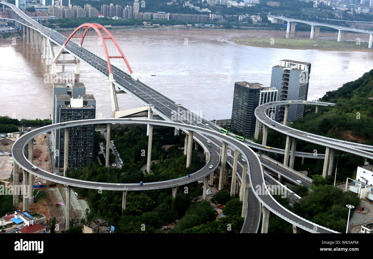 Cars drive on China's tallest highway interchange, Sujiaba Interchange ...