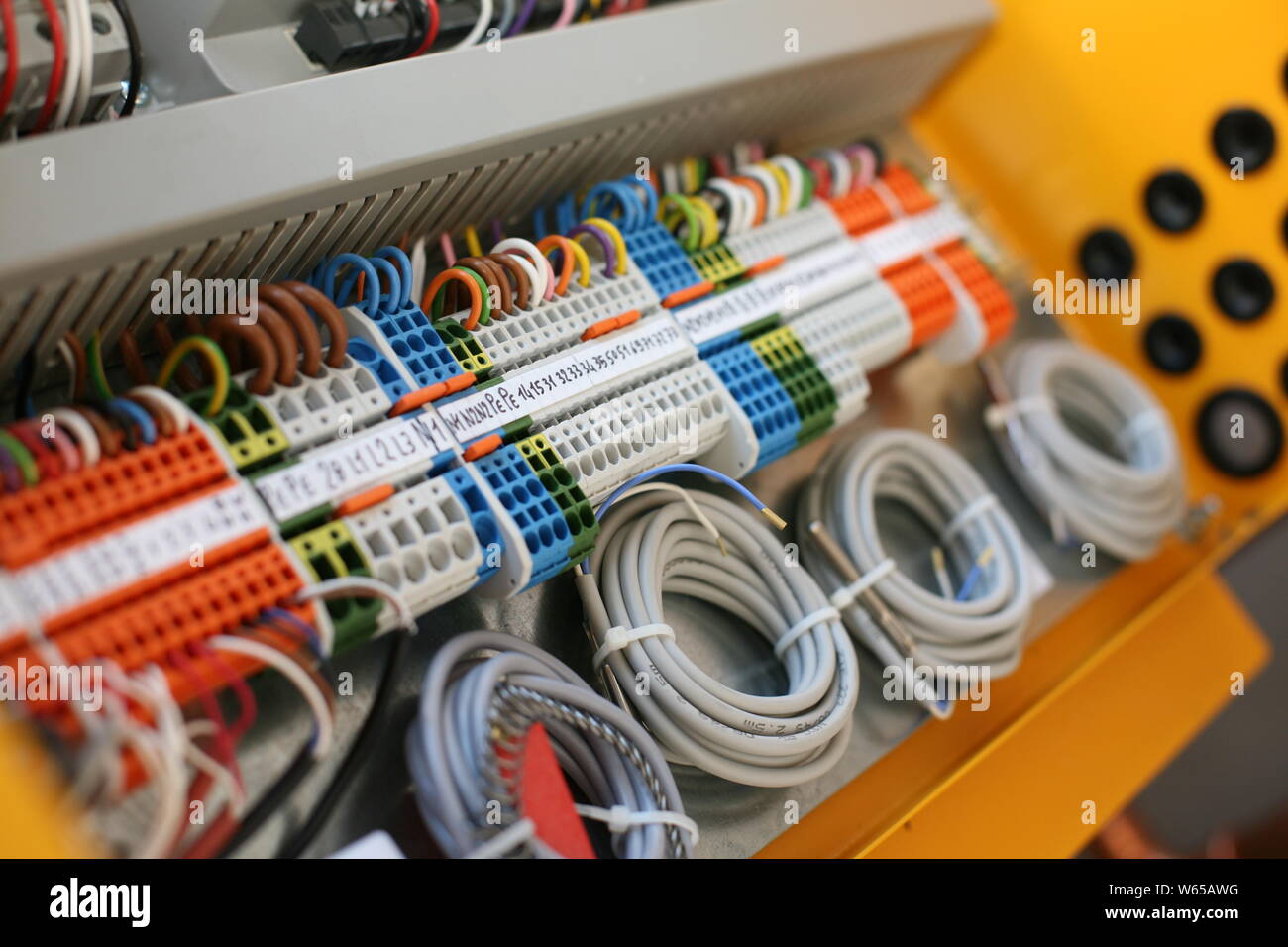 Electrical device connectors and fuses yellow chassis Stock Photo - Alamy