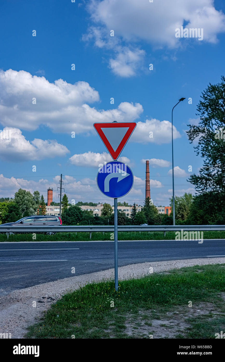 road signs showing directions on the street Stock Photo - Alamy